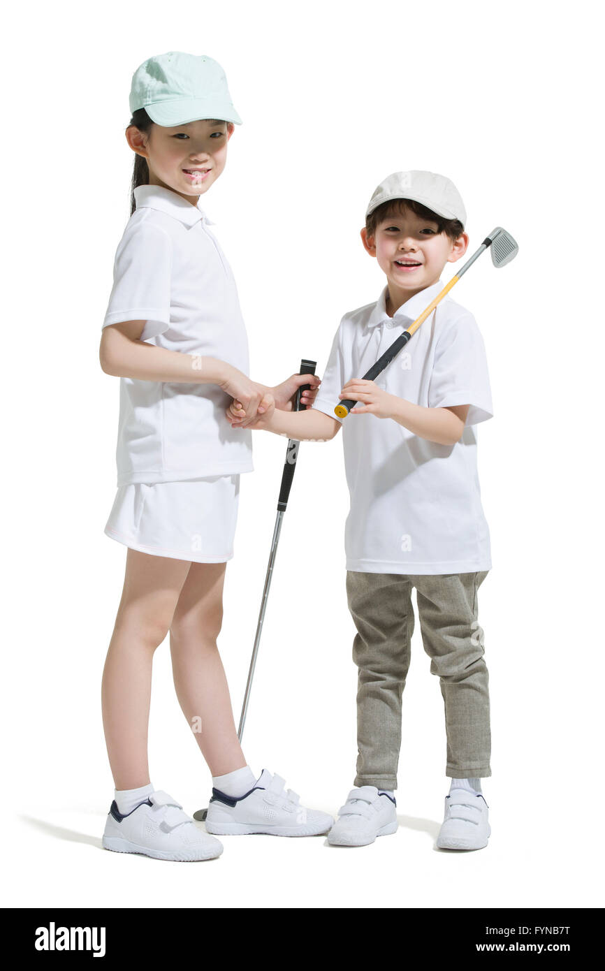 Cute children playing golf Stock Photo - Alamy