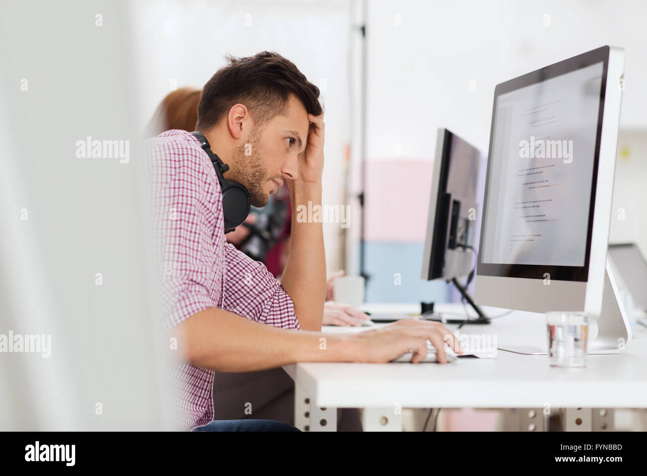 stressed software developer at office Stock Photo - Alamy