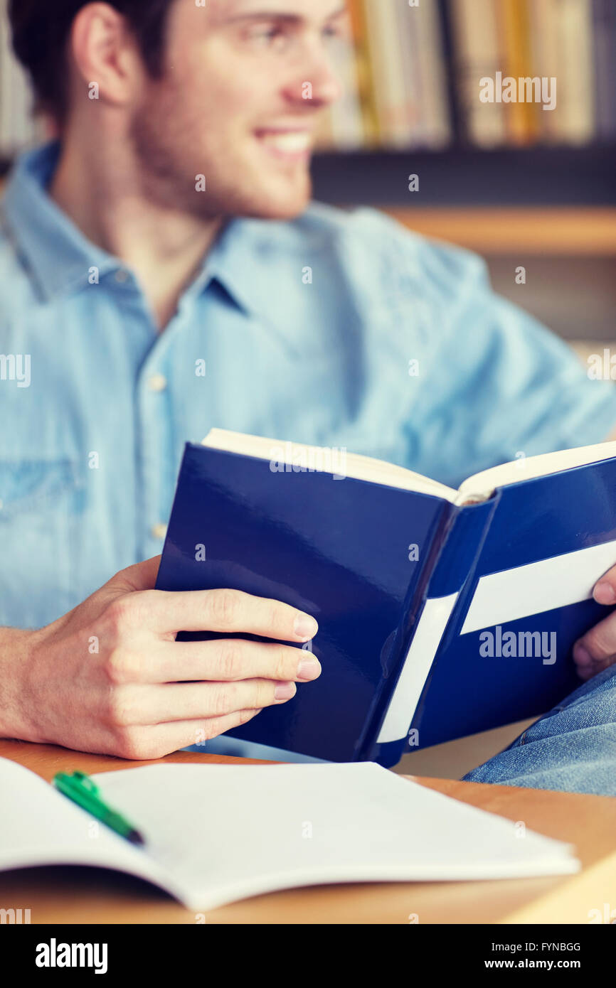 close up of student reading book at school Stock Photo - Alamy
