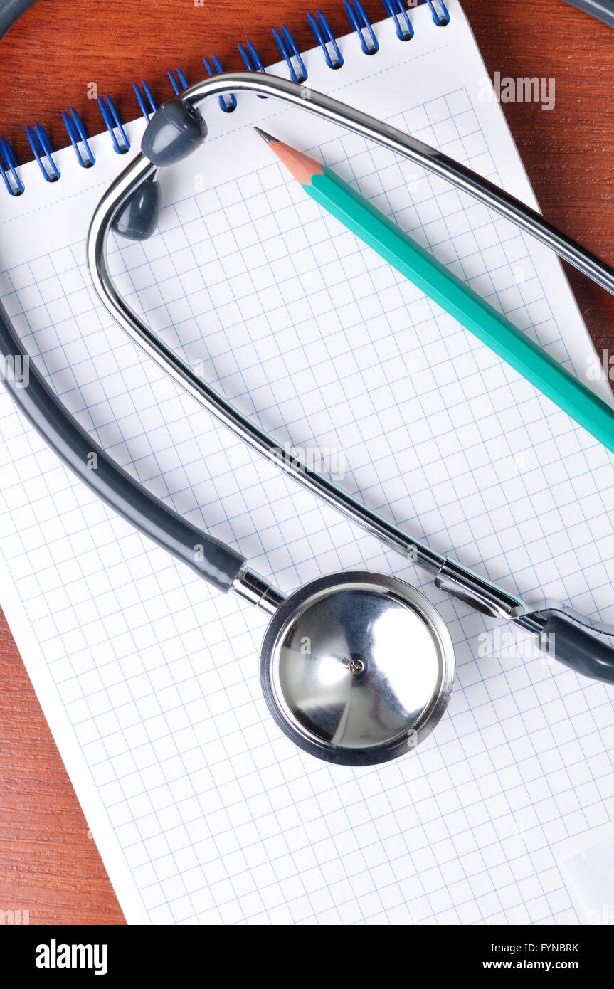 stethoscope on a notepad Stock Photo - Alamy