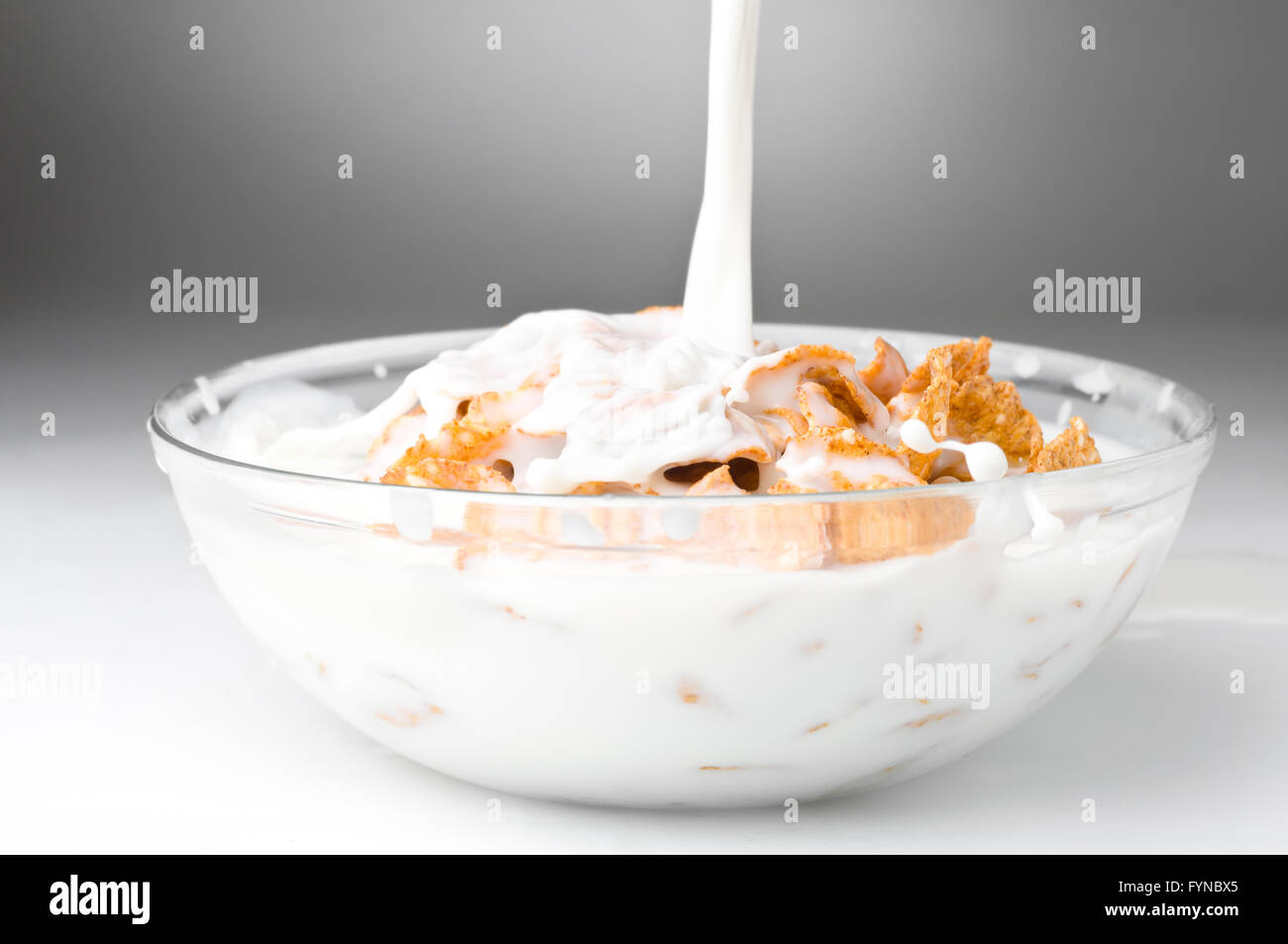 Pouring fresh milk bowl full hi-res stock photography and images - Alamy