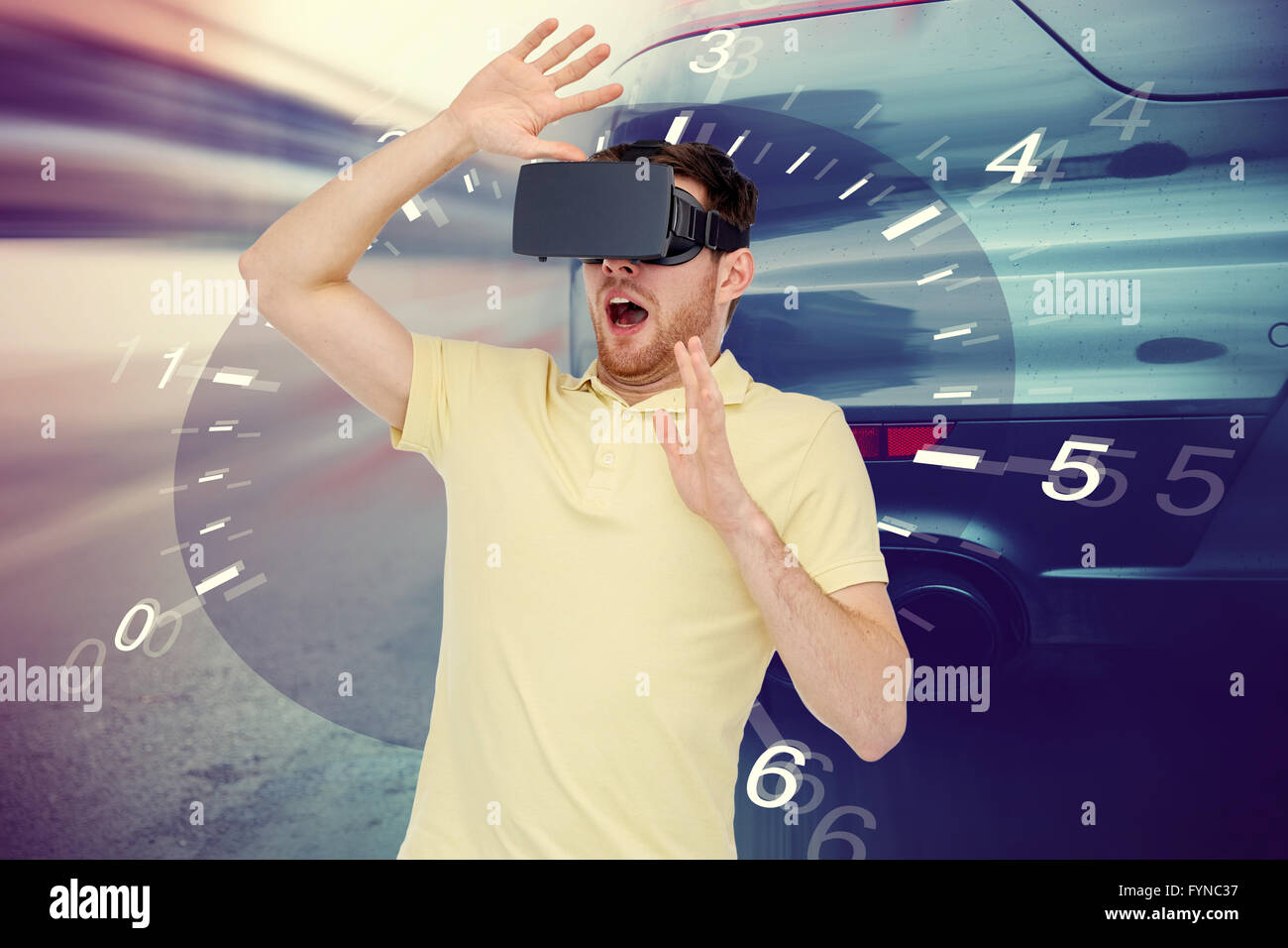 man in virtual reality headset and car racing game Stock Photo - Alamy