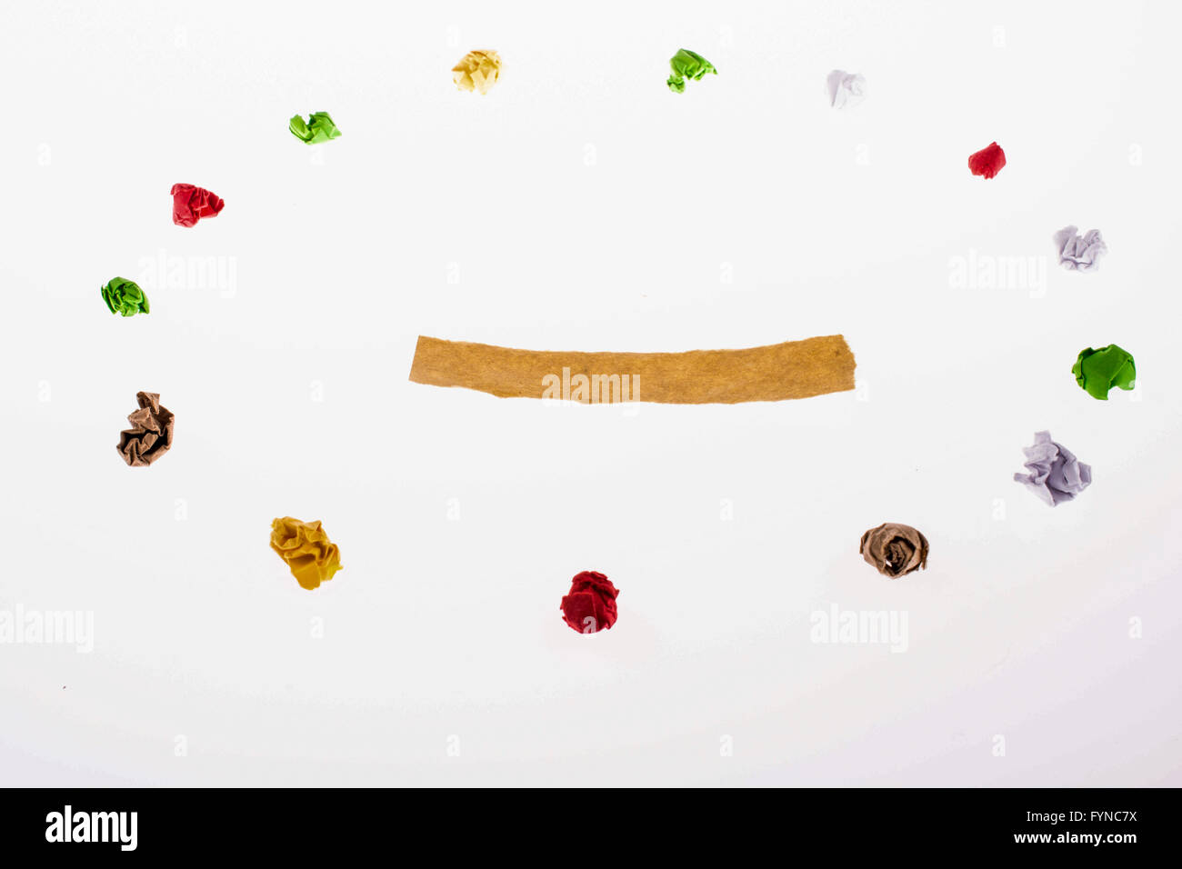 Colorful crumpled papers form a round shape on white background Stock ...