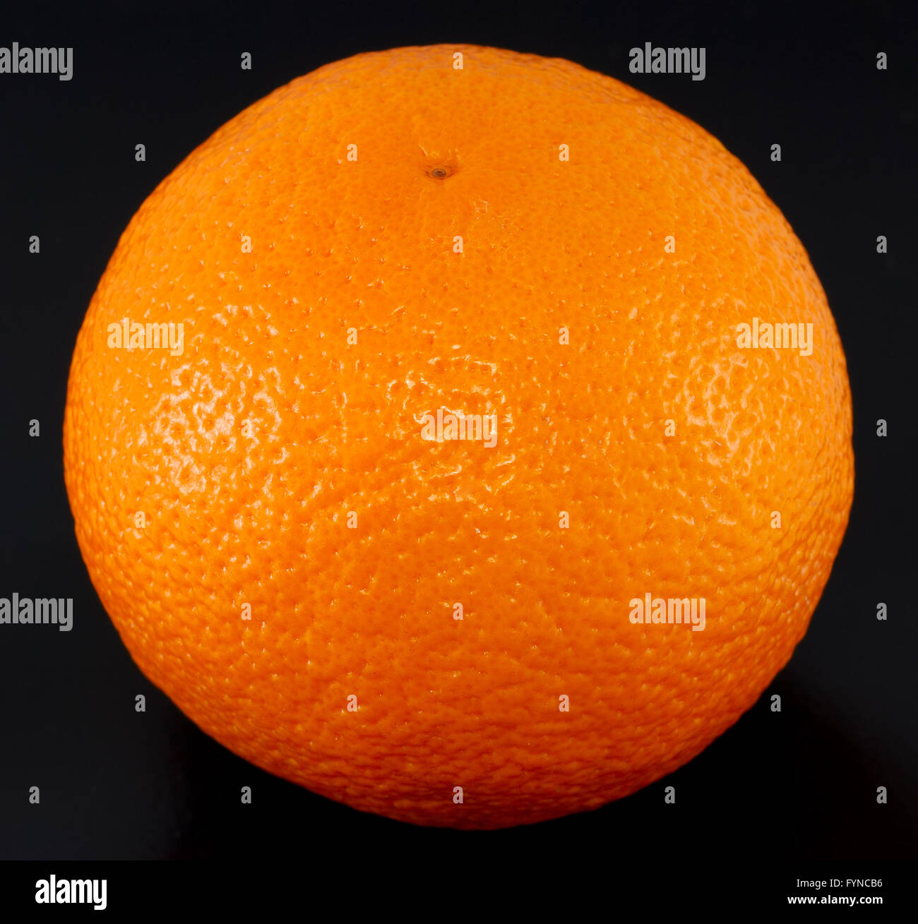 Orange isolated on black Stock Photo - Alamy