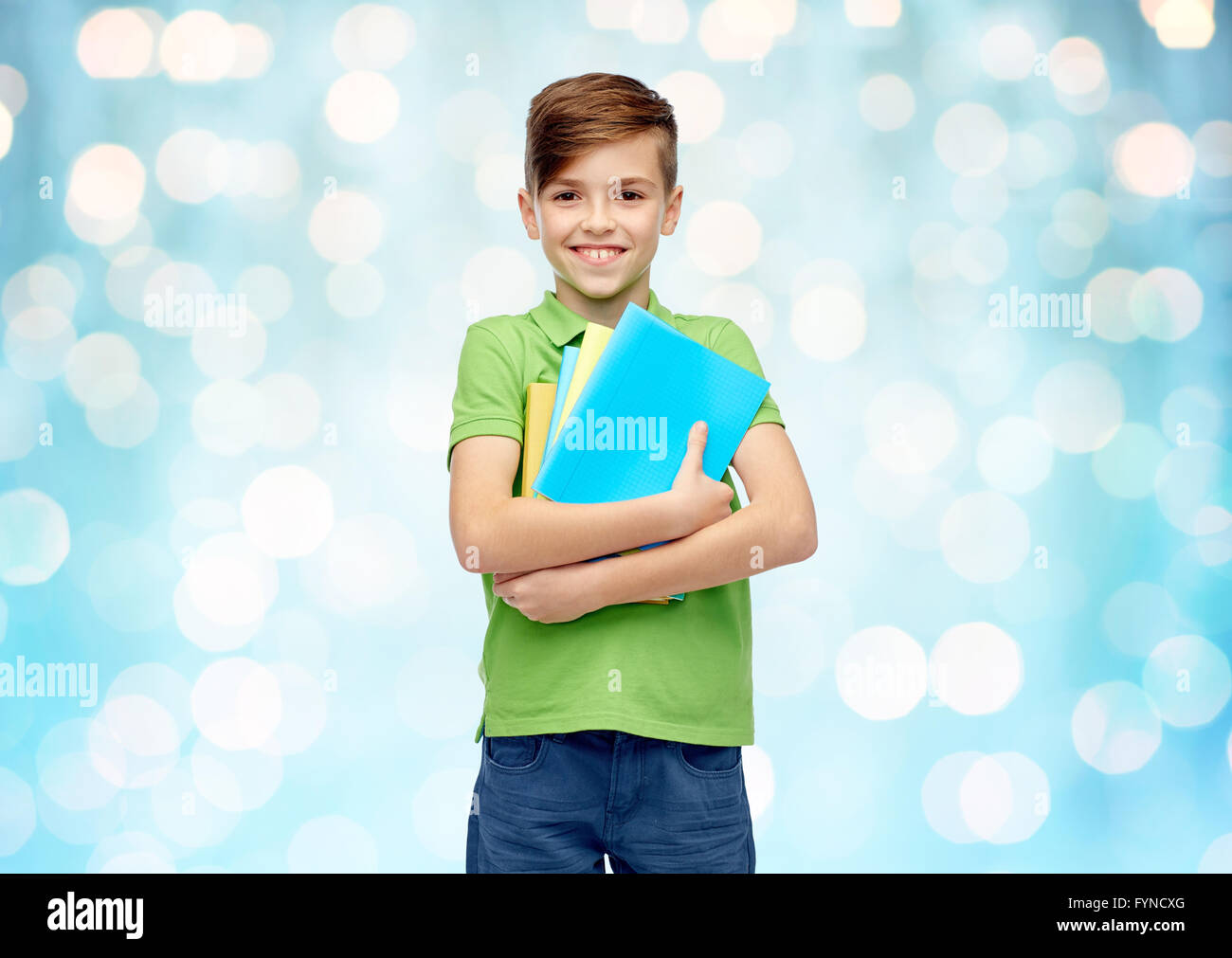 happy student boy with folders and notebooks Stock Photo - Alamy