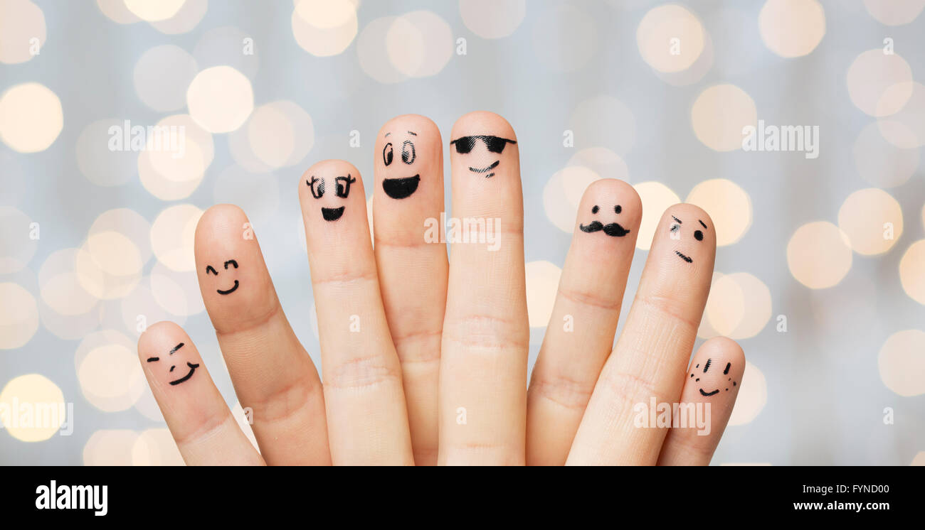 close up of hands and fingers with smiley faces Stock Photo - Alamy