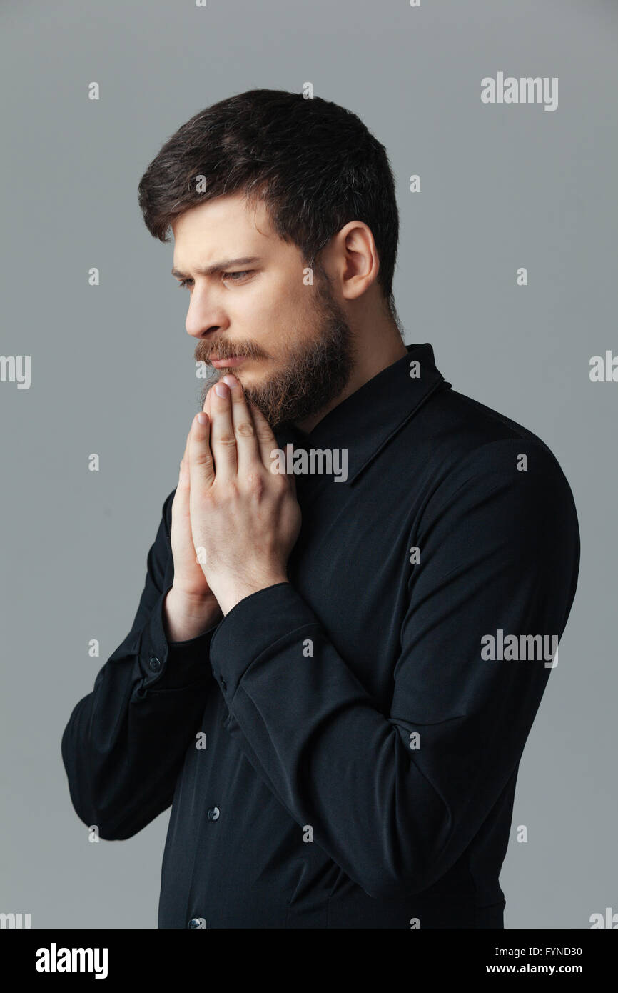 Portrait religious businessman praying hi-res stock photography and ...