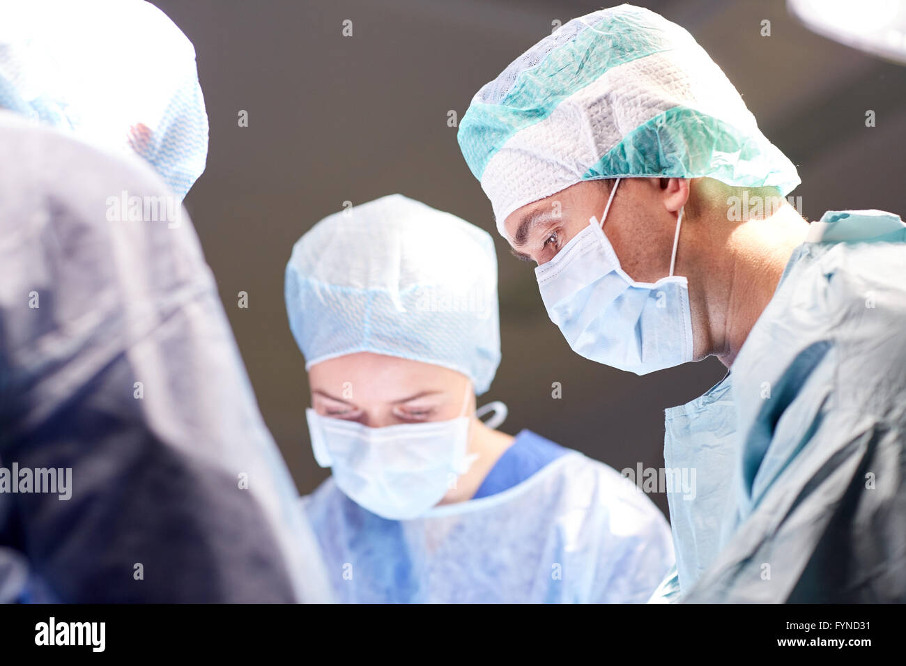 group of surgeons in operating room at hospital Stock Photo - Alamy