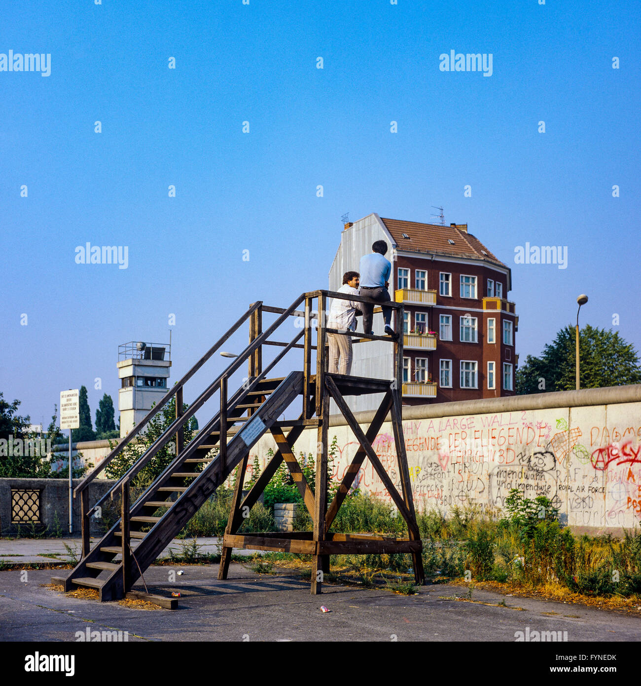 August 1986, Berlin Wall, two men on observation platform, East Berlin ...