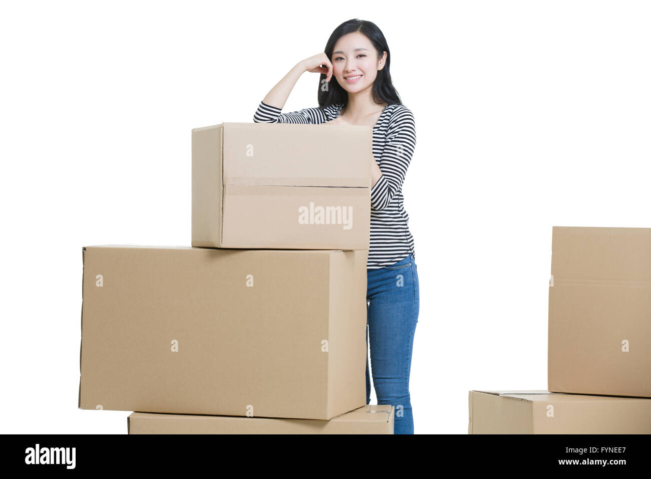 Young woman moving house Stock Photo - Alamy