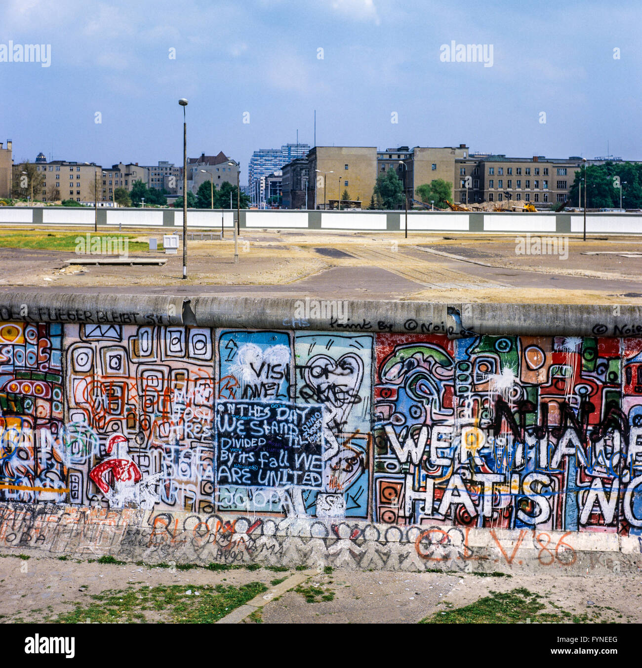 August 1986, Berlin wall graffitis at Potsdamer Platz square with view ...