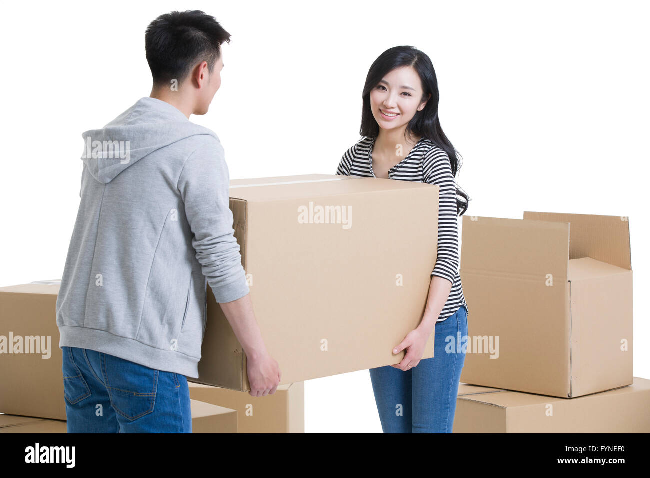 Young couple moving house Stock Photo - Alamy