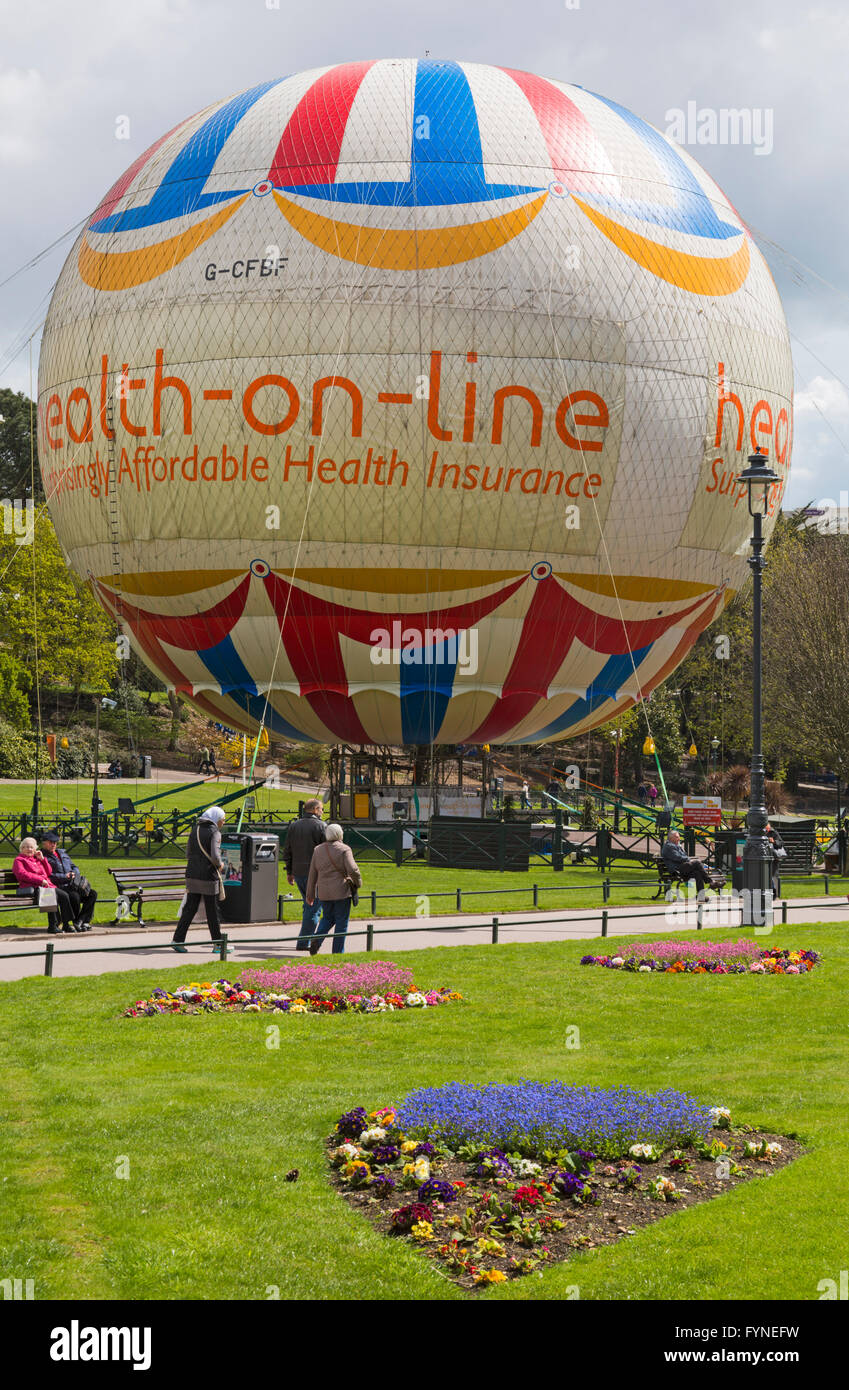 Visitors walk in Bournemouth pleasure lower gardens past the ...