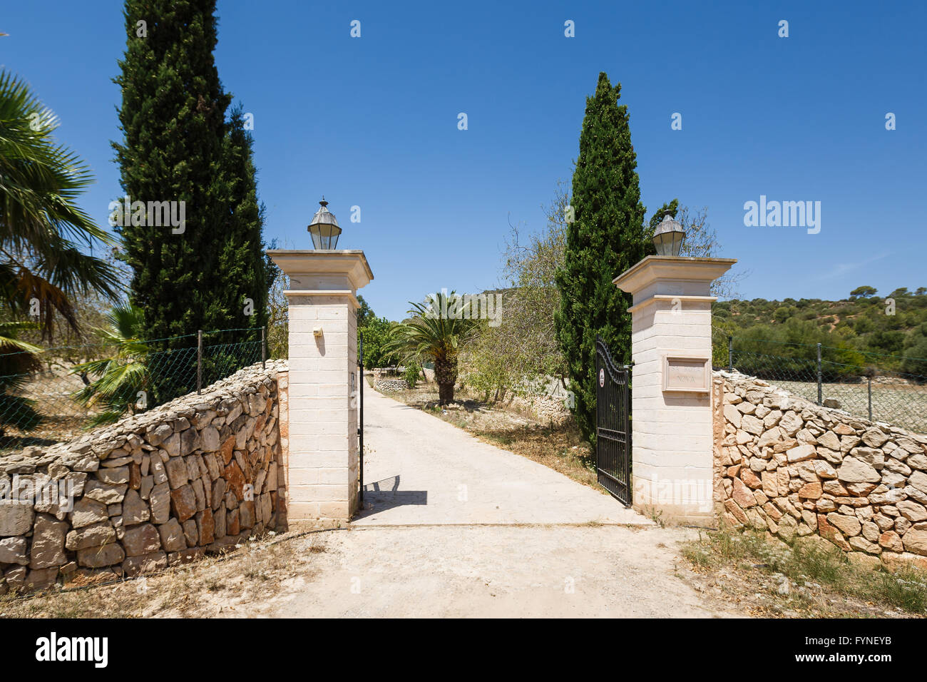 The gate to the Spanish house in Mallorca Stock Photo - Alamy