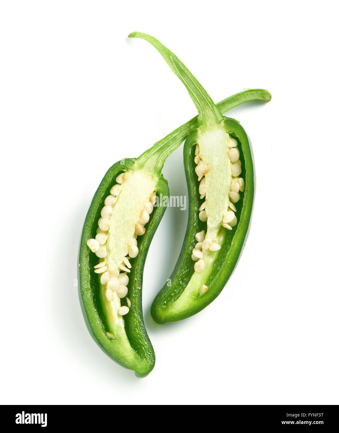 sliced green peper on a white background with a soft shadow Stock Photo ...