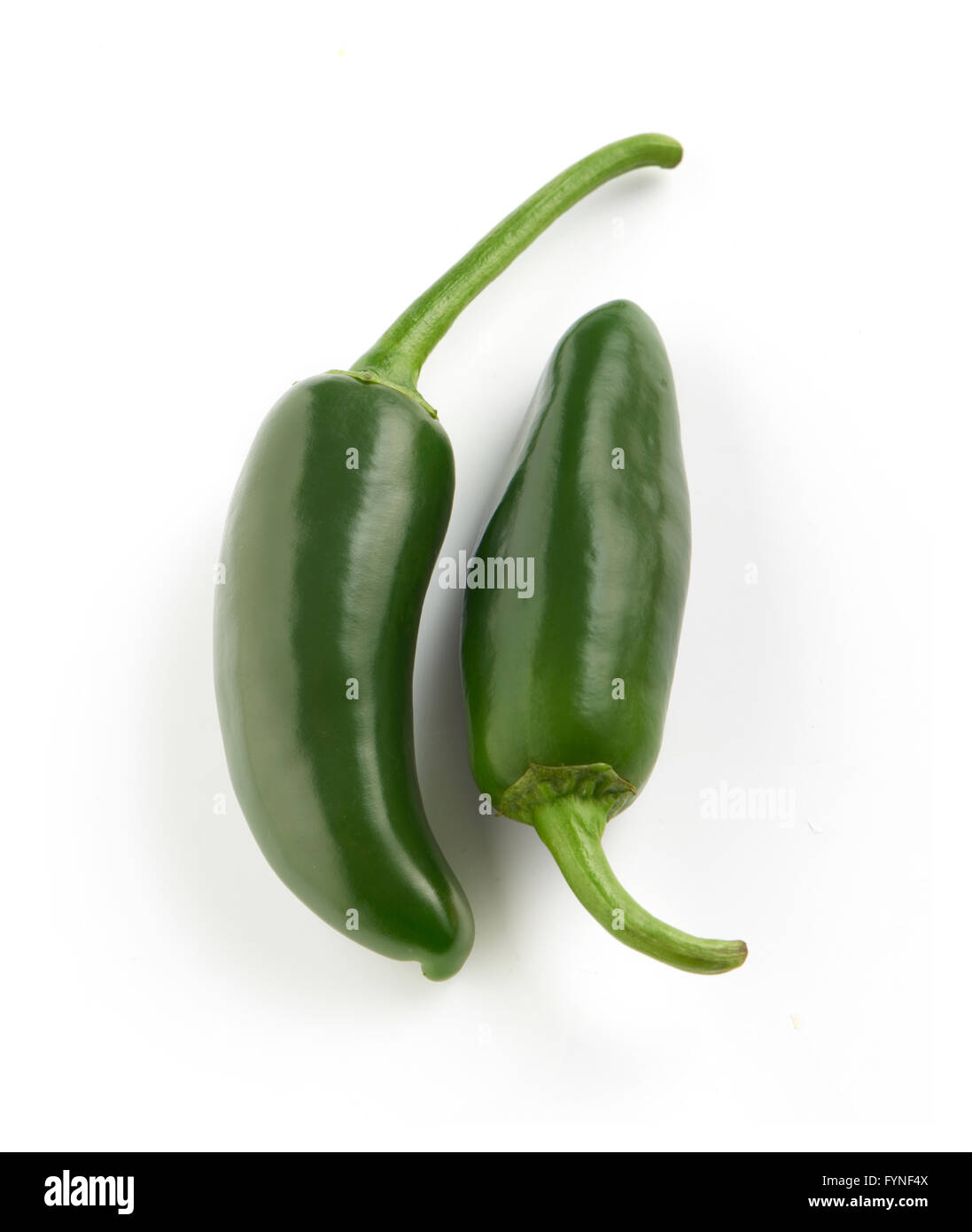 green pepers on a white background with a soft shadow Stock Photo - Alamy