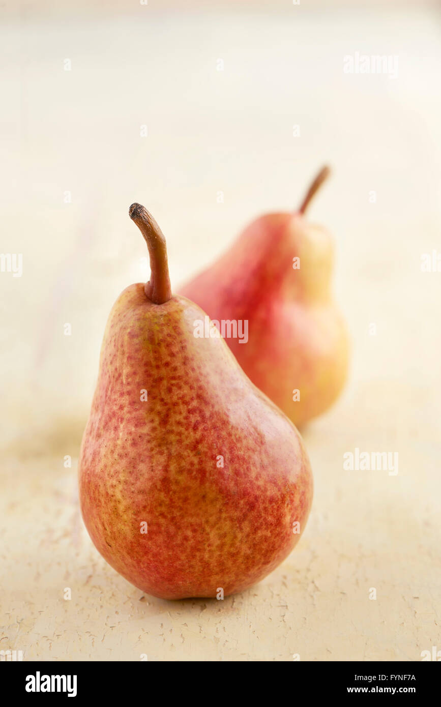 Beautiful Side Profile View of Two Whole Ripe Pears with Red Skin and ...