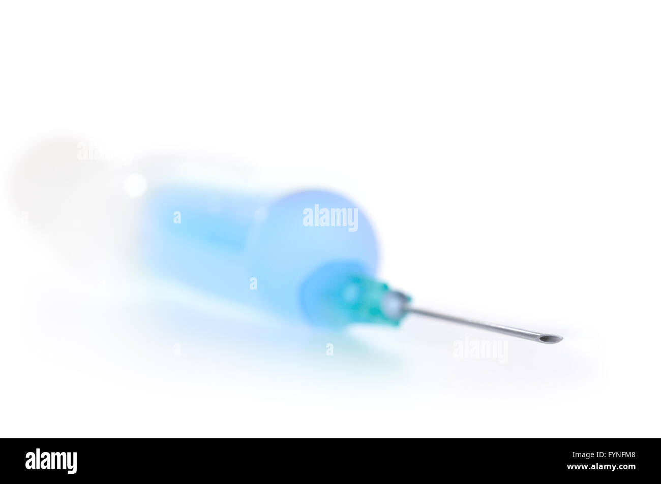 syringe with blue liquid isolated on white Stock Photo - Alamy