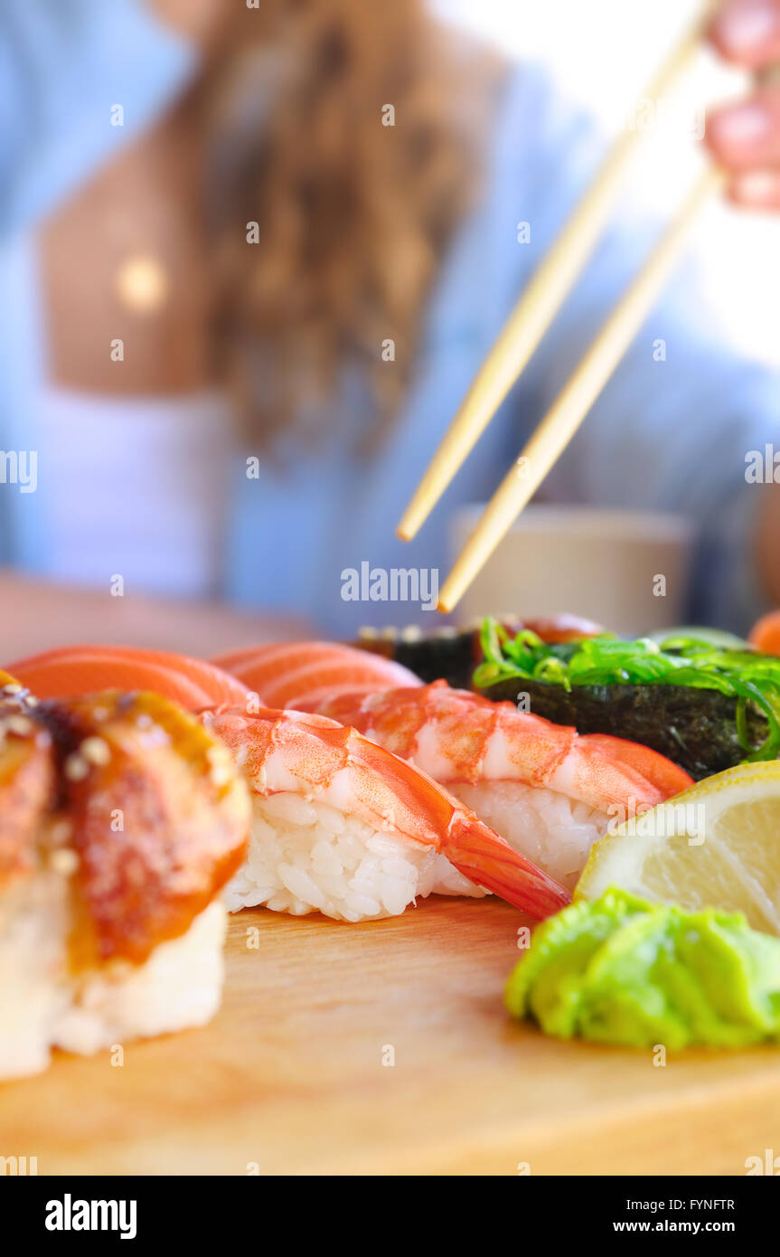 eating japanese food Stock Photo - Alamy