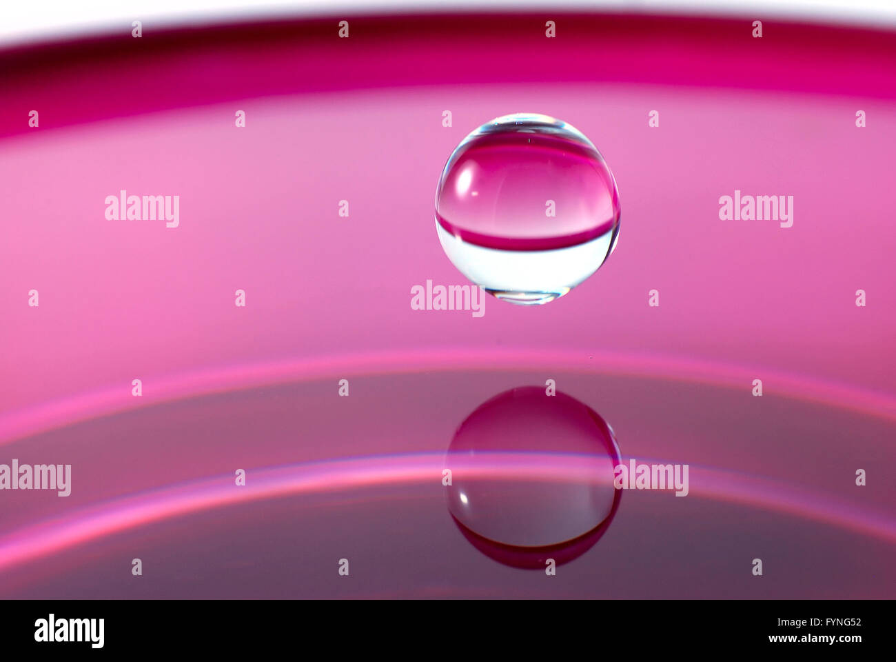 Water drops falling down Stock Photo - Alamy