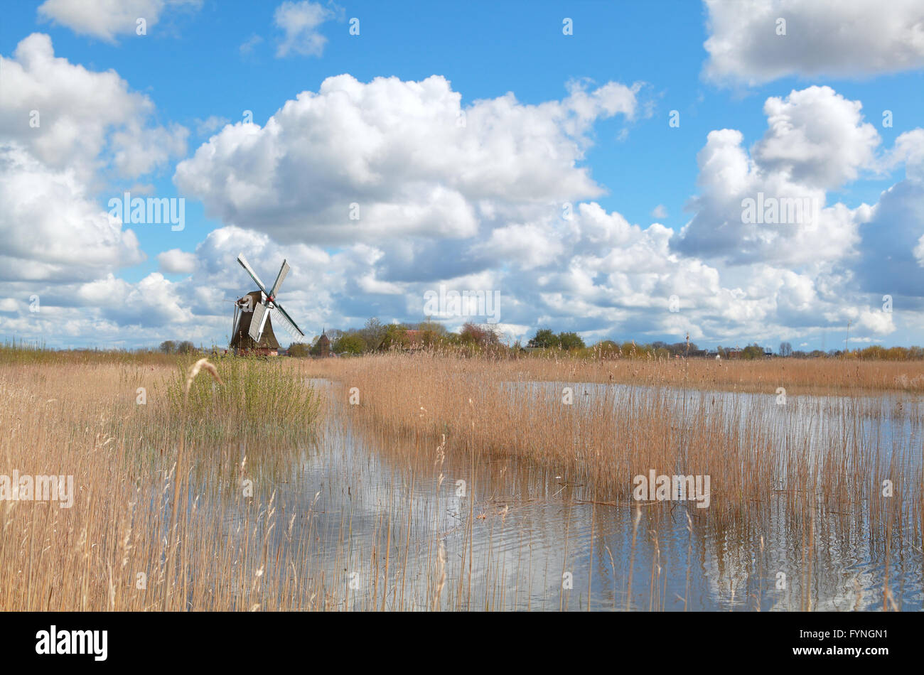 Dutch windmill and beautiful blue sky, Holland Stock Photo - Alamy