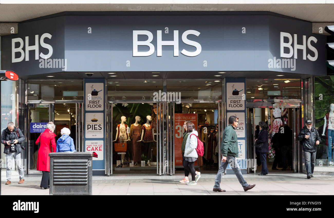 Shoppers walk past the BHS flagship store in London's Oxford Street ...