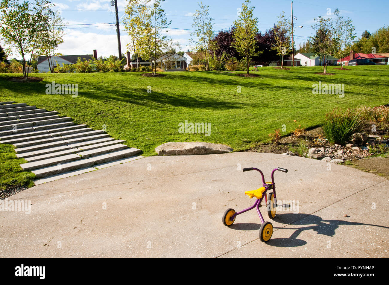 Tricycle in park Stock Photo - Alamy