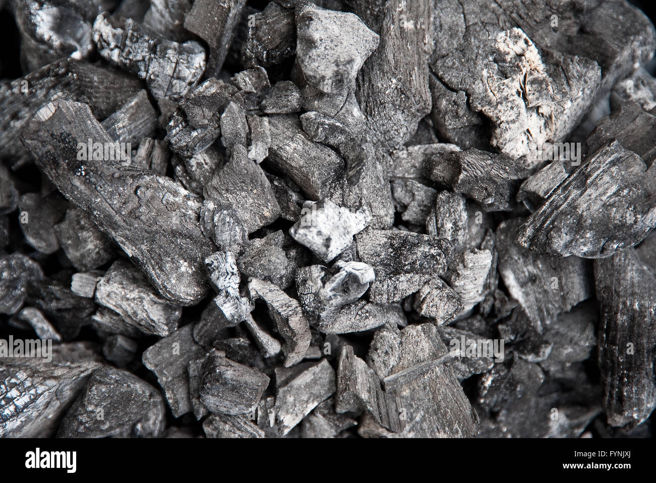 Group of charcoal lumps Stock Photo - Alamy
