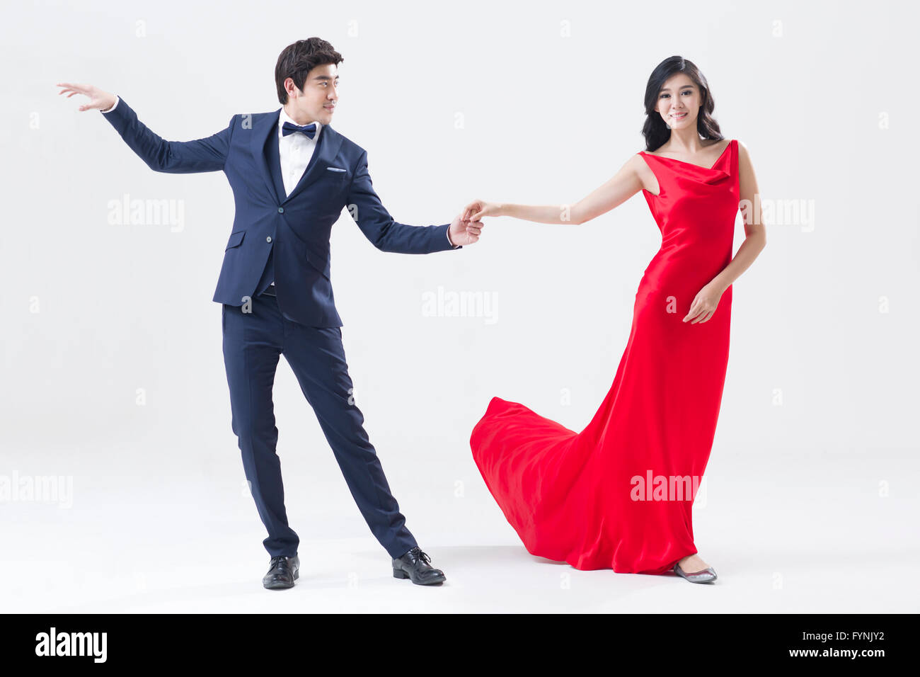 Elegant young couple dancing Stock Photo - Alamy