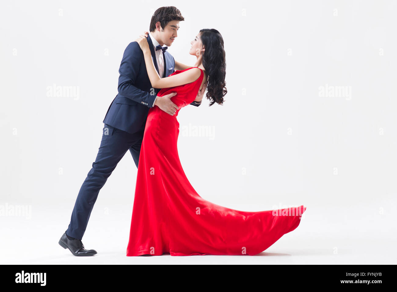 Elegant young couple dancing Stock Photo - Alamy