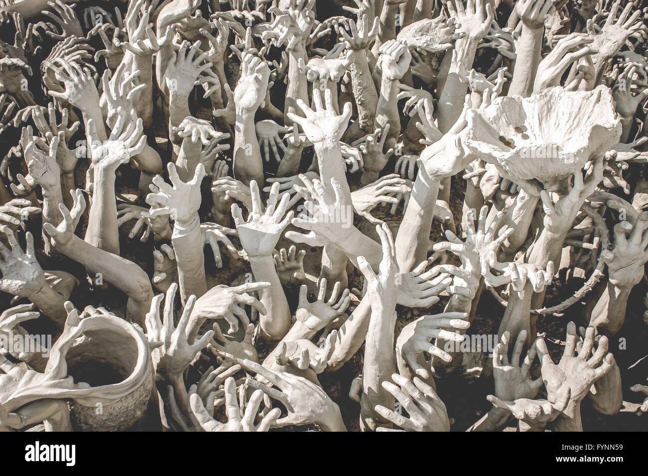 Hands Statue At Wat Rong Khun Stock Photo - Alamy
