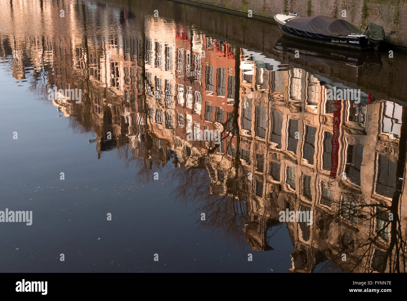 Urban landscape, city view of Amsterdam, The Netherlands, Holland. Traditional buildings, homes ...