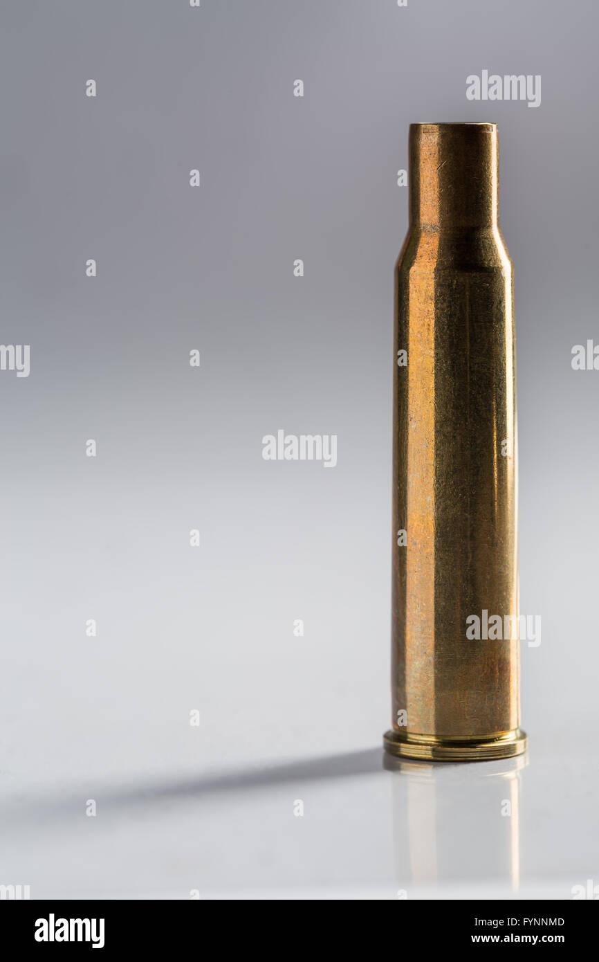 Shoot empty gun shell Stock Photo - Alamy
