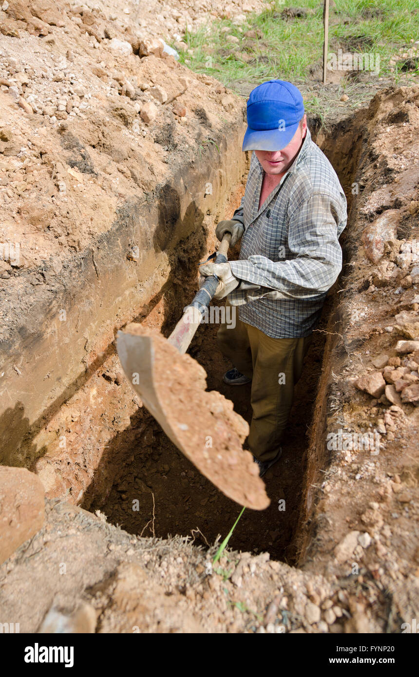 grave digger at work Stock Photo - Alamy