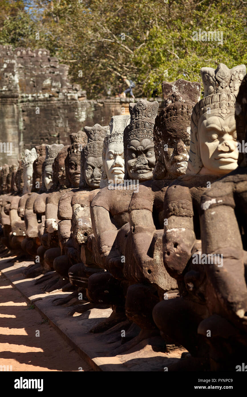 Statues of Asuras on South Gate Bridge, Angkor Thom (12th century ...