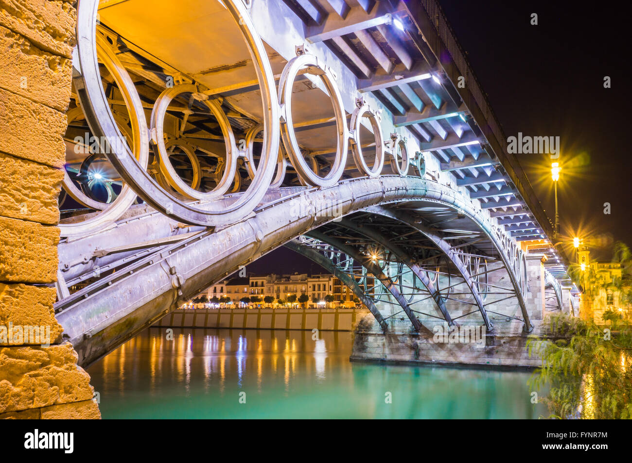 Seville is divided in two by the river Guadalquivir, and its most ...