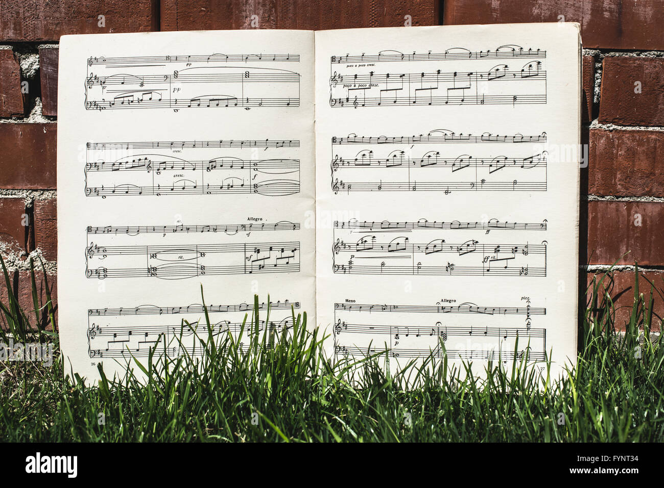 Book with piano sheet music hi-res stock photography and images - Alamy