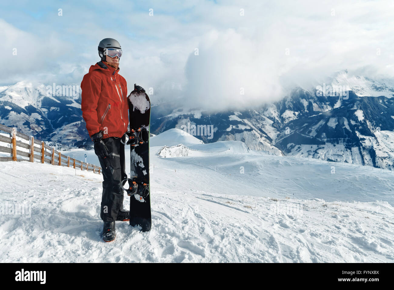 Snowboarder with the board Stock Photo - Alamy