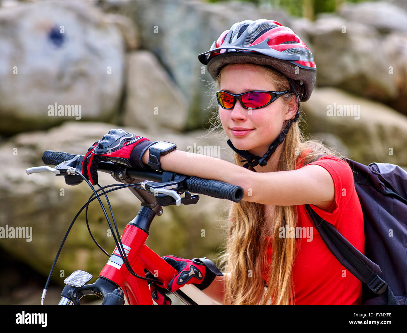 Bikes cycling girl. Bicyclist girl watch on watches Stock Photo - Alamy