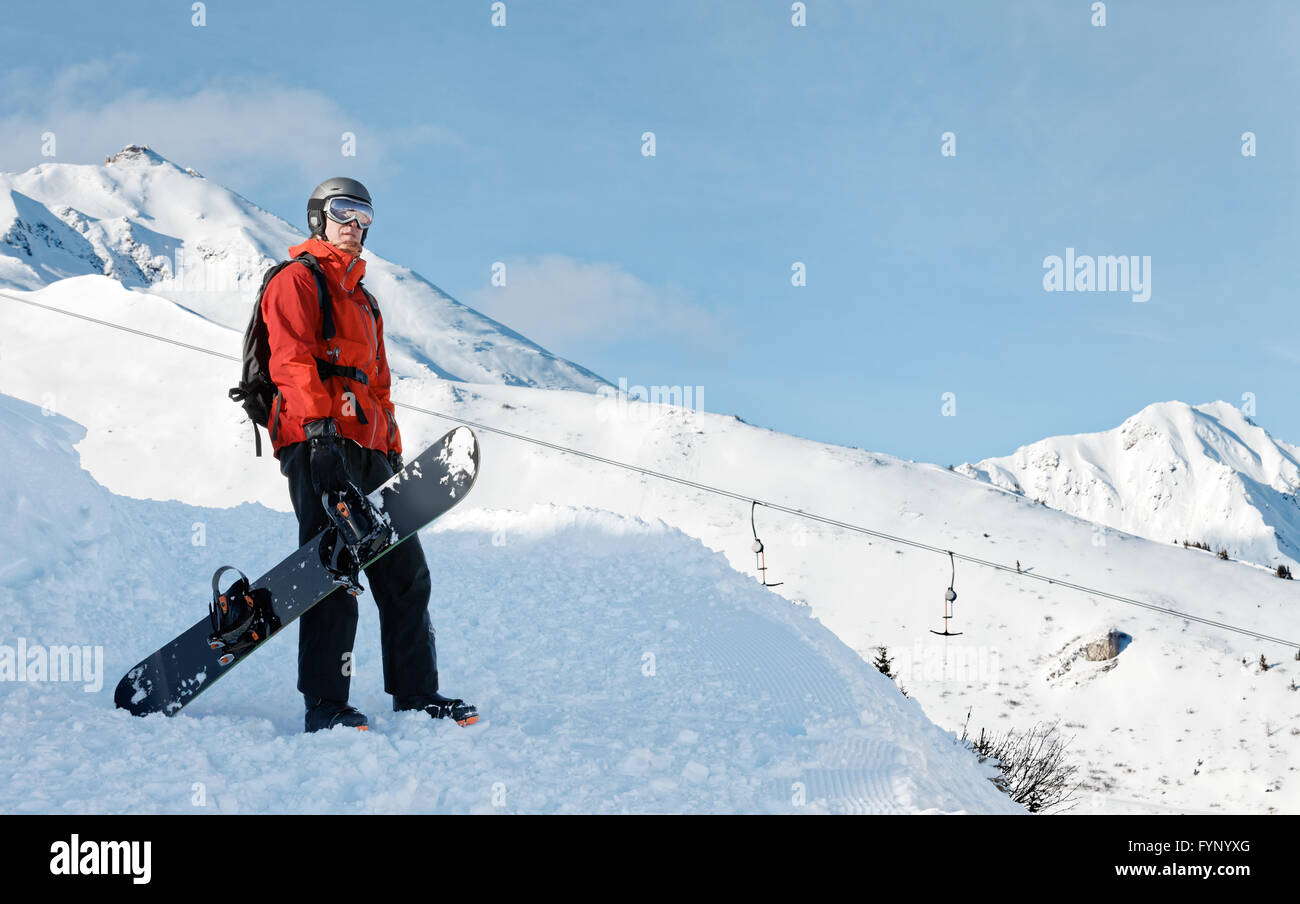 Snowboarder with the board Stock Photo - Alamy
