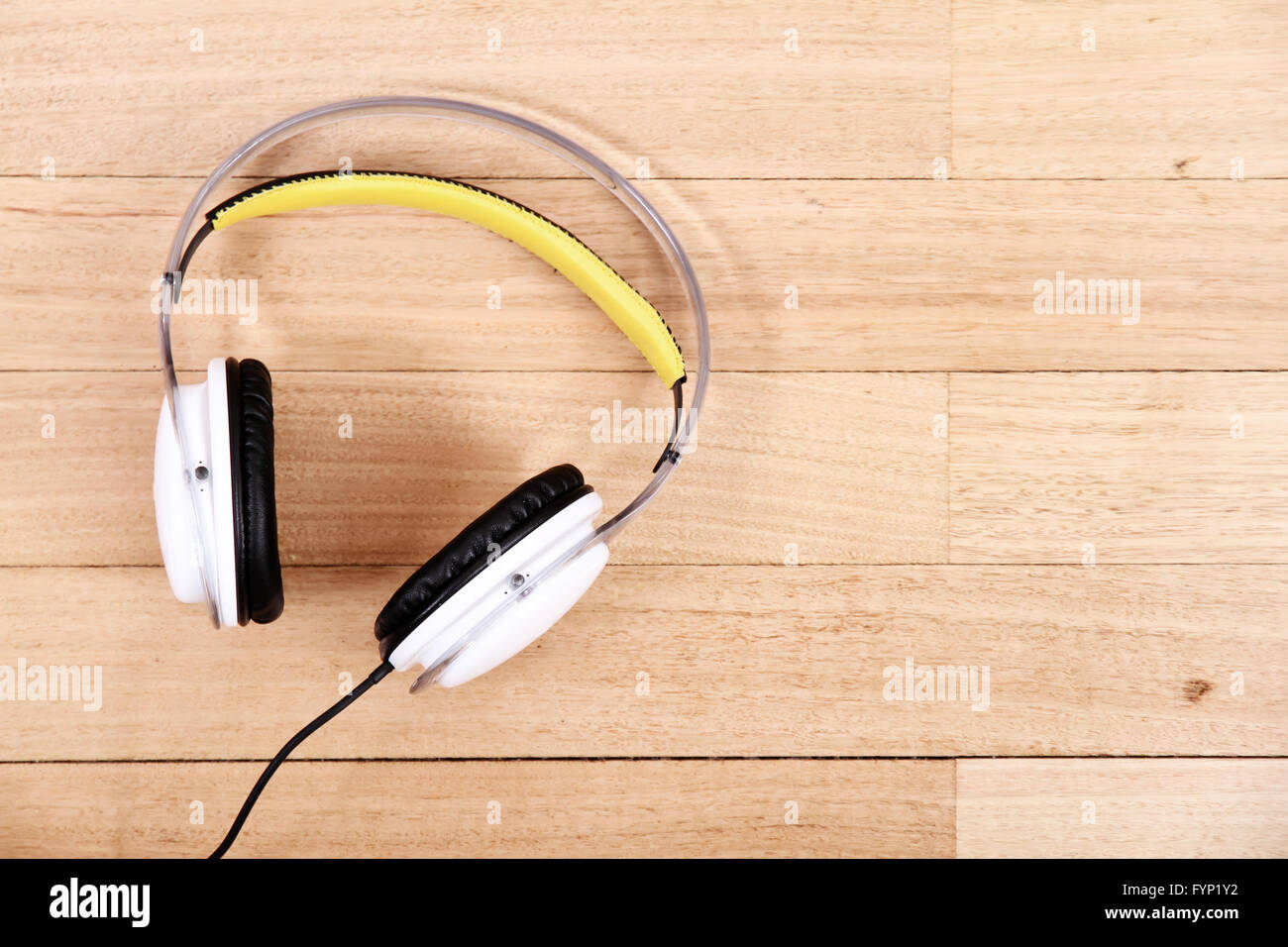 Headphones on the floor Stock Photo - Alamy