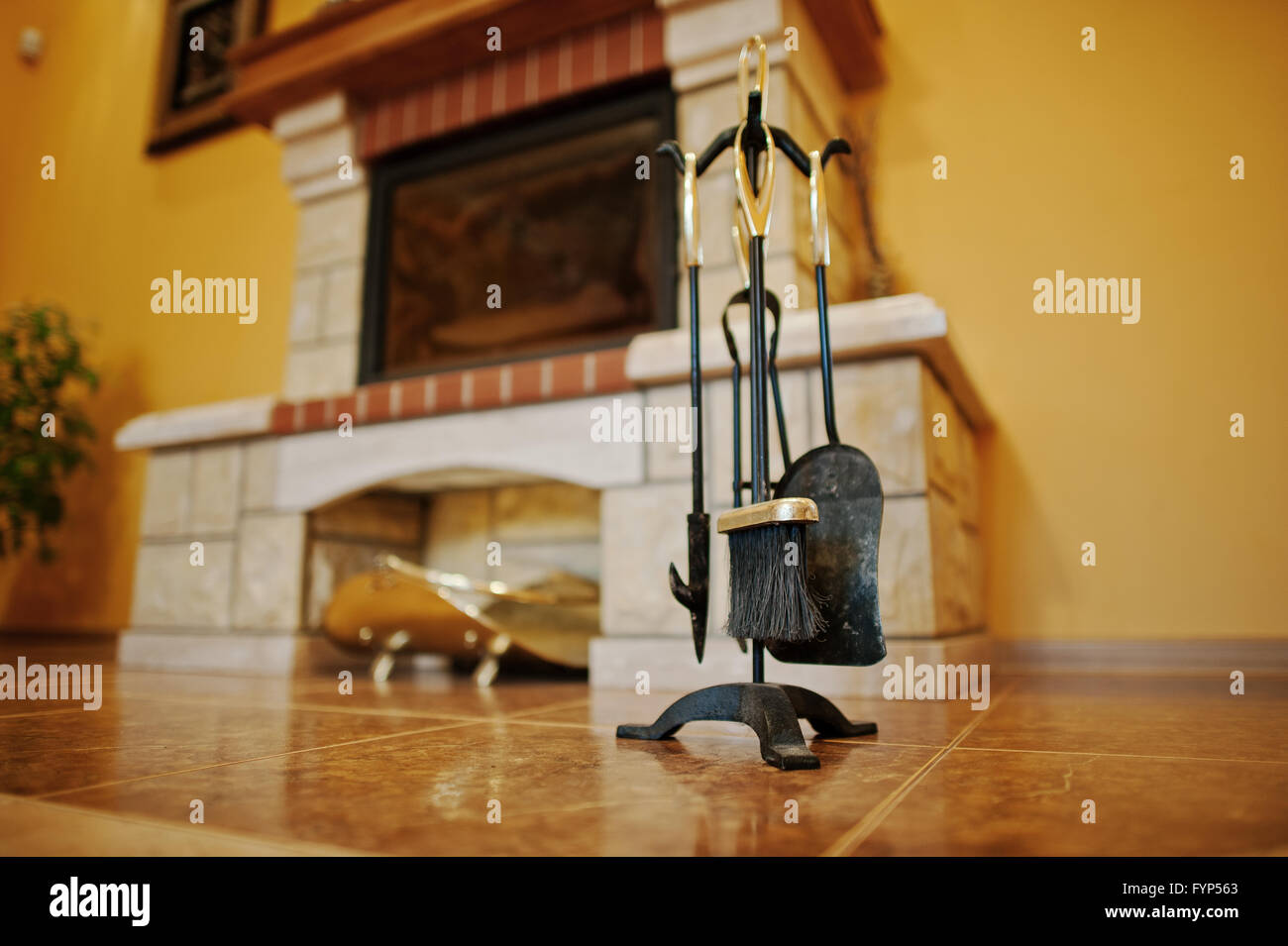 Fireplace accessories tools background fireplace Stock Photo - Alamy