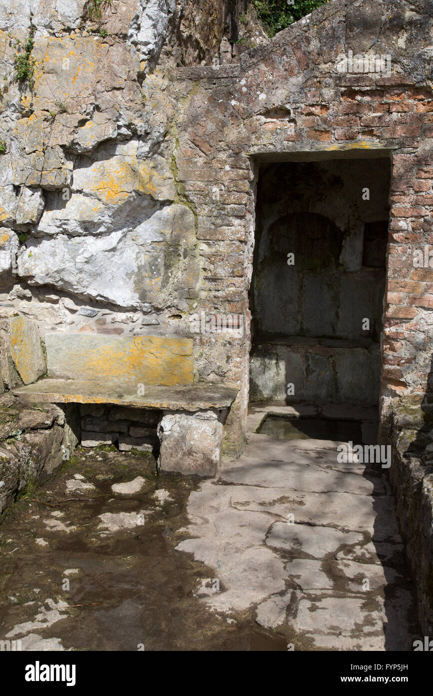 Penmon Priory, Wales. Picturesque view of St Seiriol's Well, located at ...