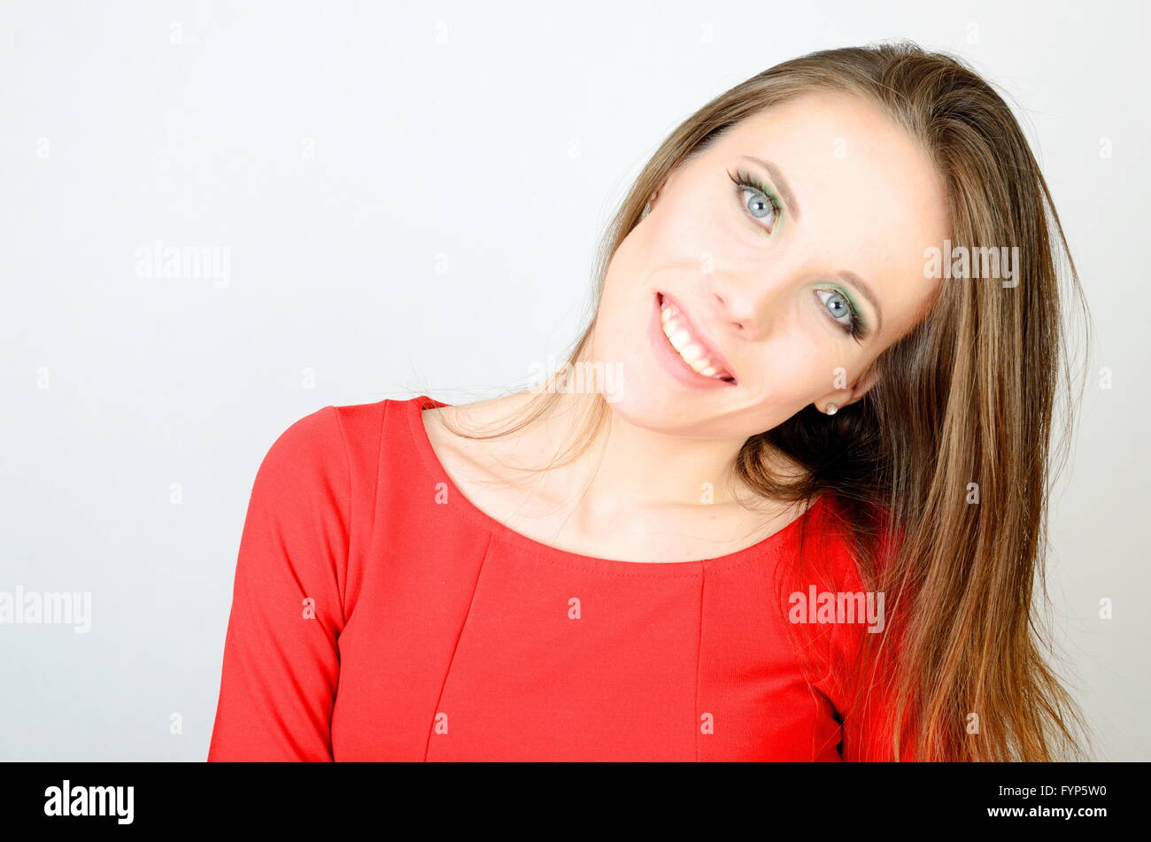 Portrait of young female model. Kind girl with smiling face. Model ...