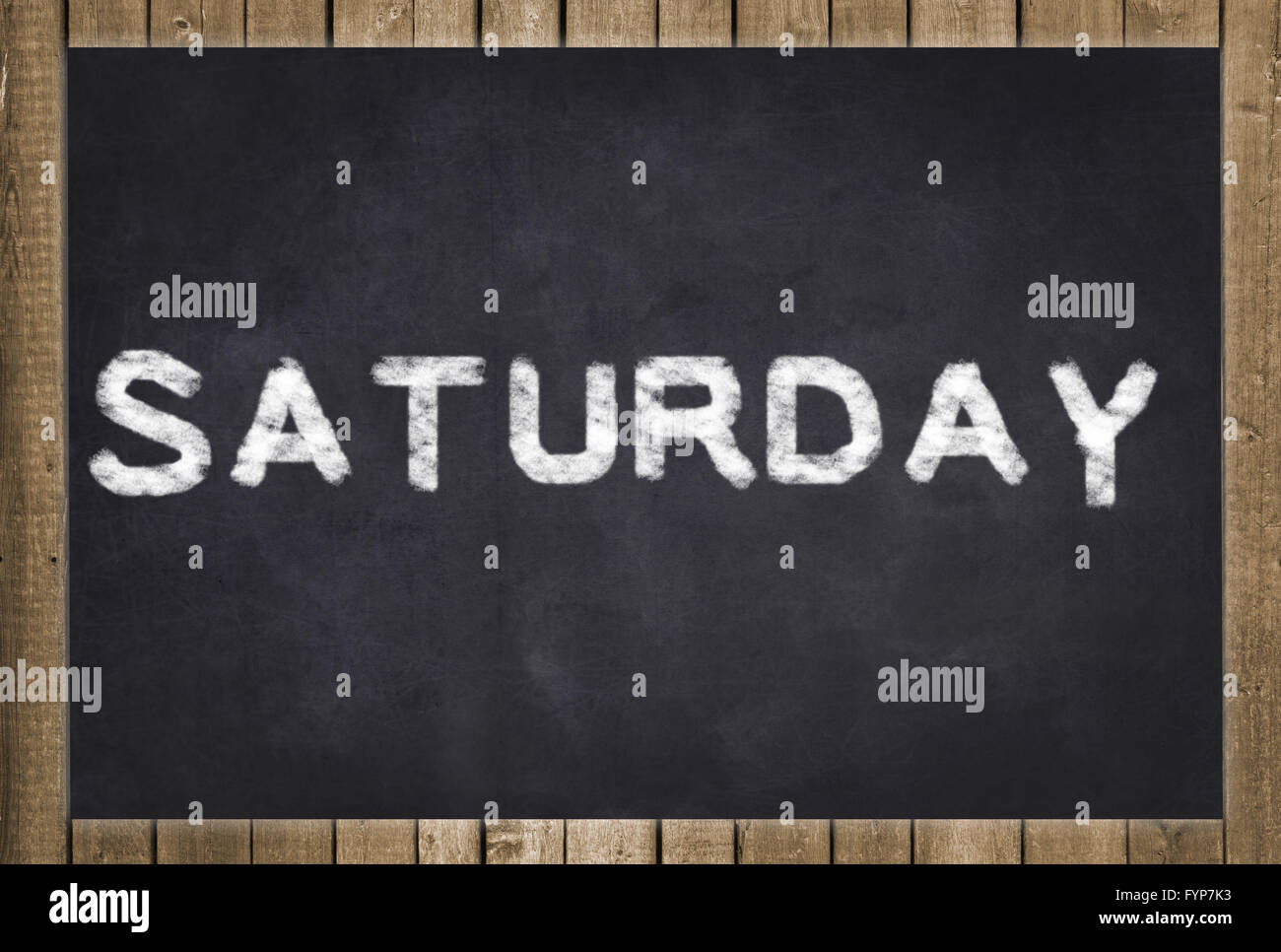 saturday text on chalkboard Stock Photo - Alamy