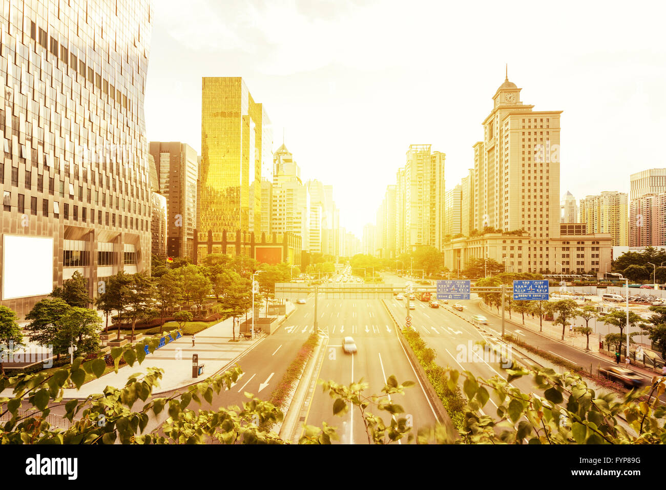 modern city street under sunset Stock Photo - Alamy