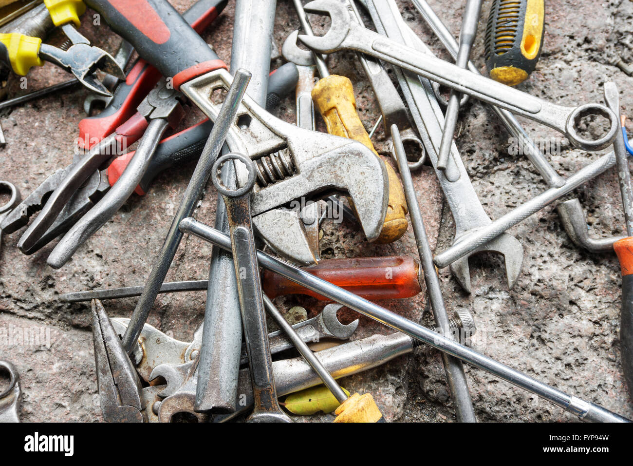 spanners and screwdrivers on the ground Stock Photo - Alamy