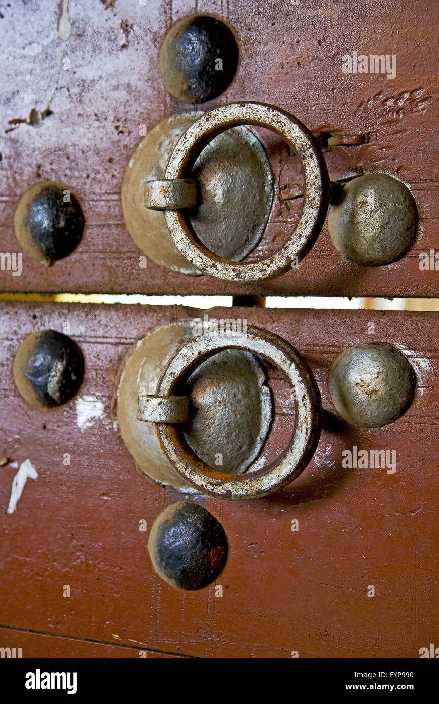 in africa the old wood facade and rusty safe padlock Stock Photo - Alamy