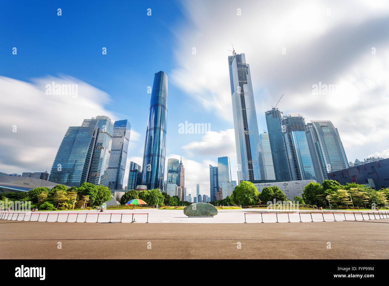 modern square and skyscrapers under blue sky Stock Photo - Alamy
