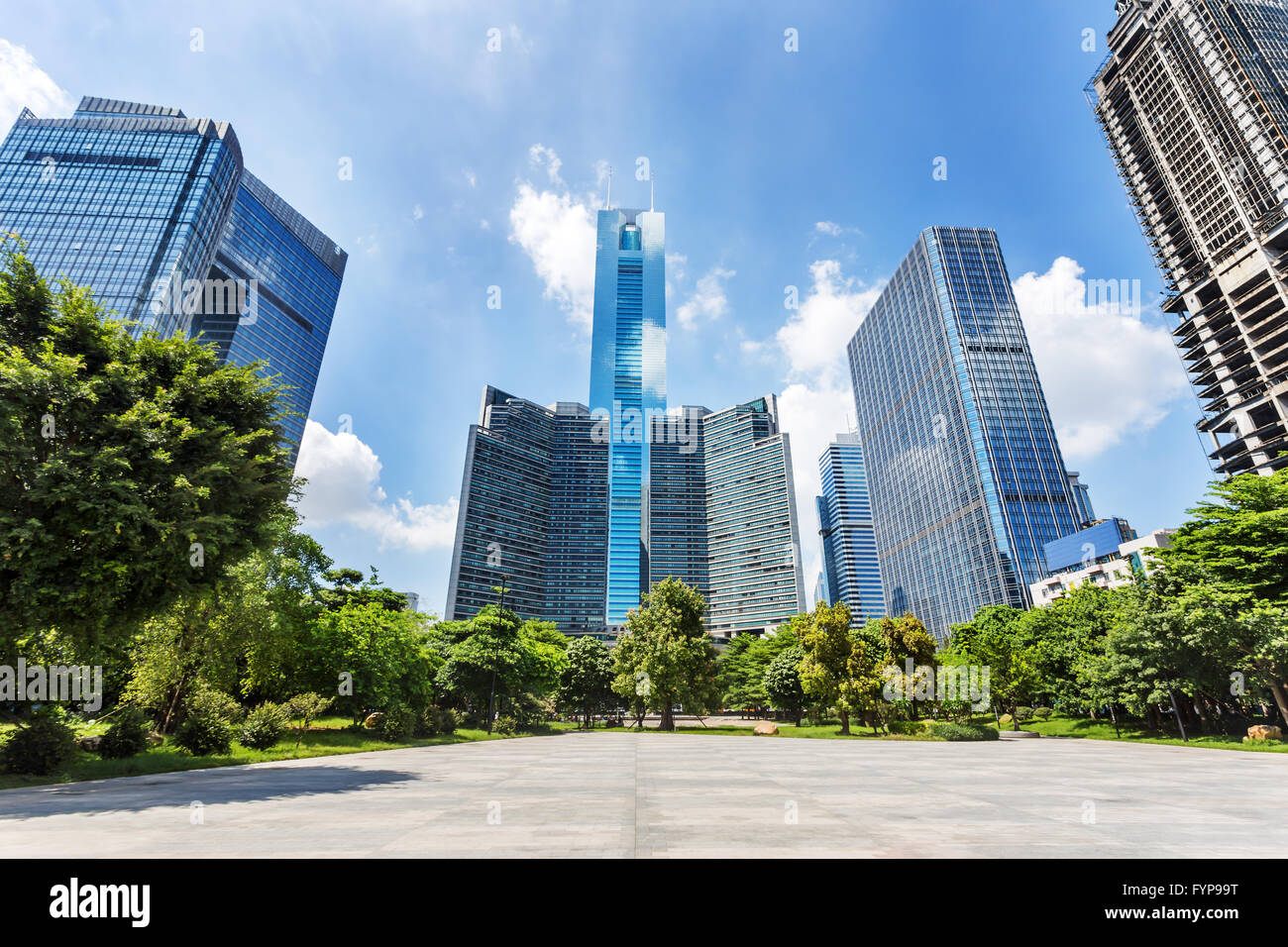 modern square and skyscrapers under blue sky Stock Photo - Alamy